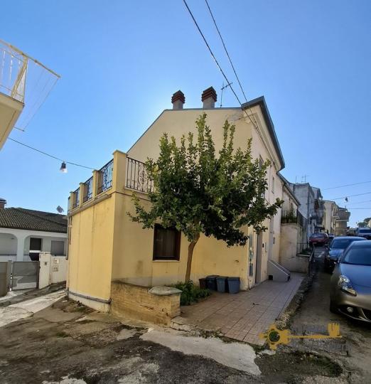 Restored character three-bedroom town house with separate apartments ...