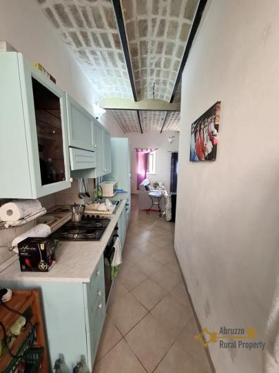 Restored character three-bedroom town house with separate apartments ...